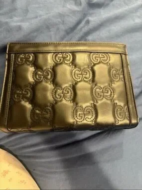 Gucci | Bags | Gucci Black Quilted Gg Logo Leather Clutch With Gold ...